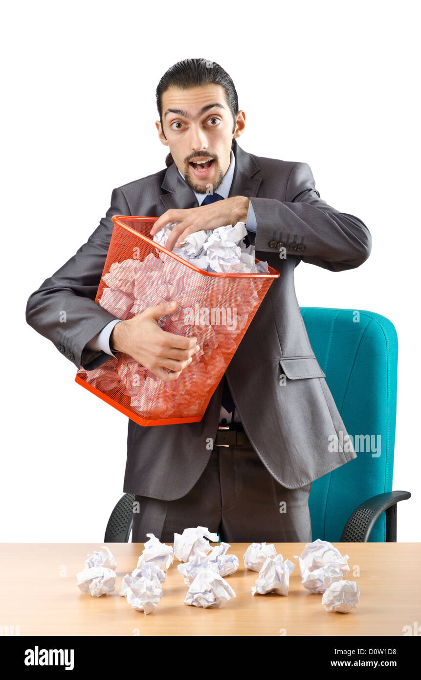 Man with lots of wasted paper Stock Photo - Alamy