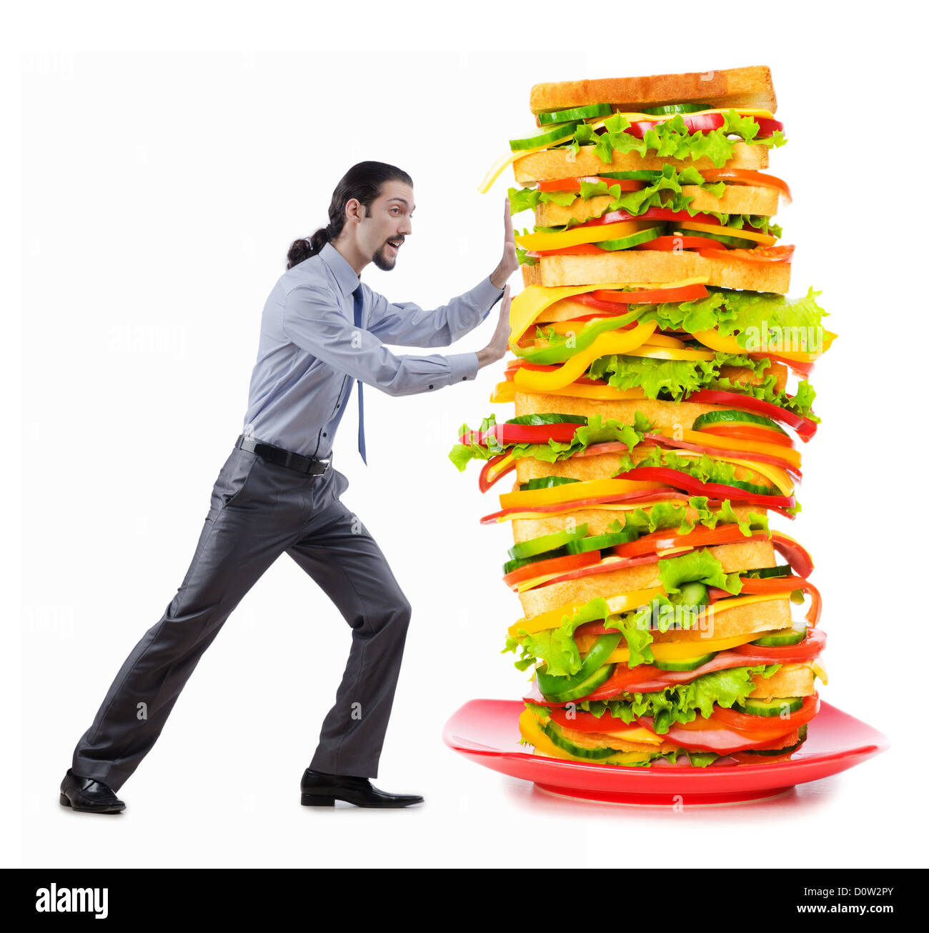 Man and giant sandwich on white Stock Photo - Alamy