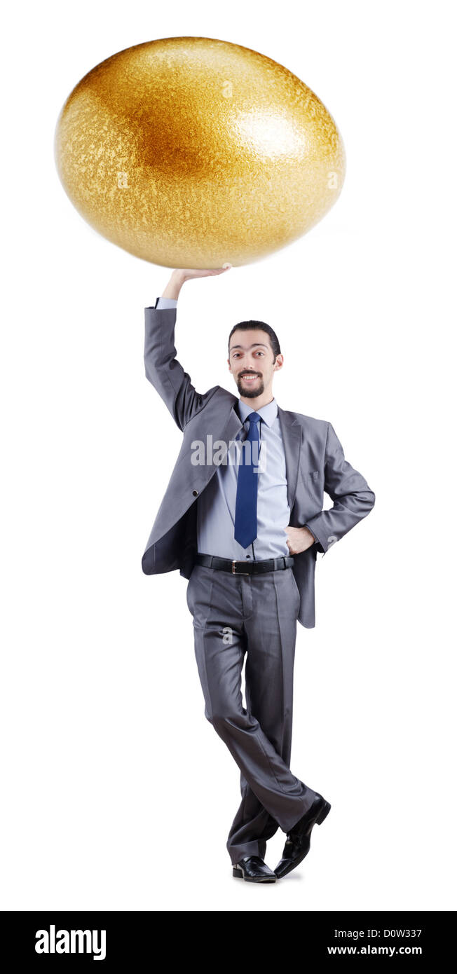 Man and golden egg isolated on white Stock Photo - Alamy