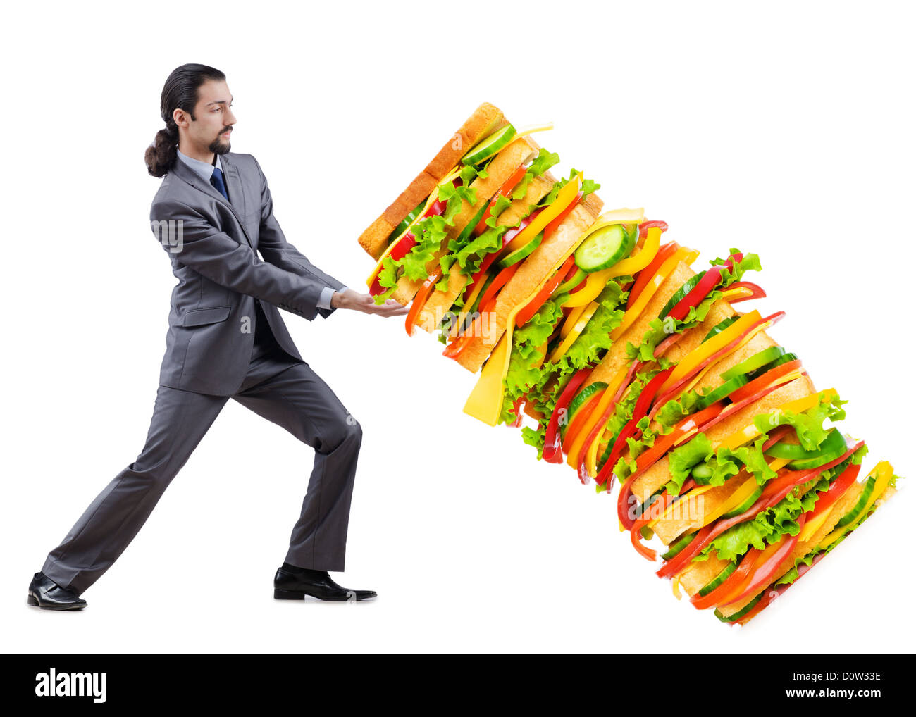 Man and giant sandwich on white Stock Photo - Alamy