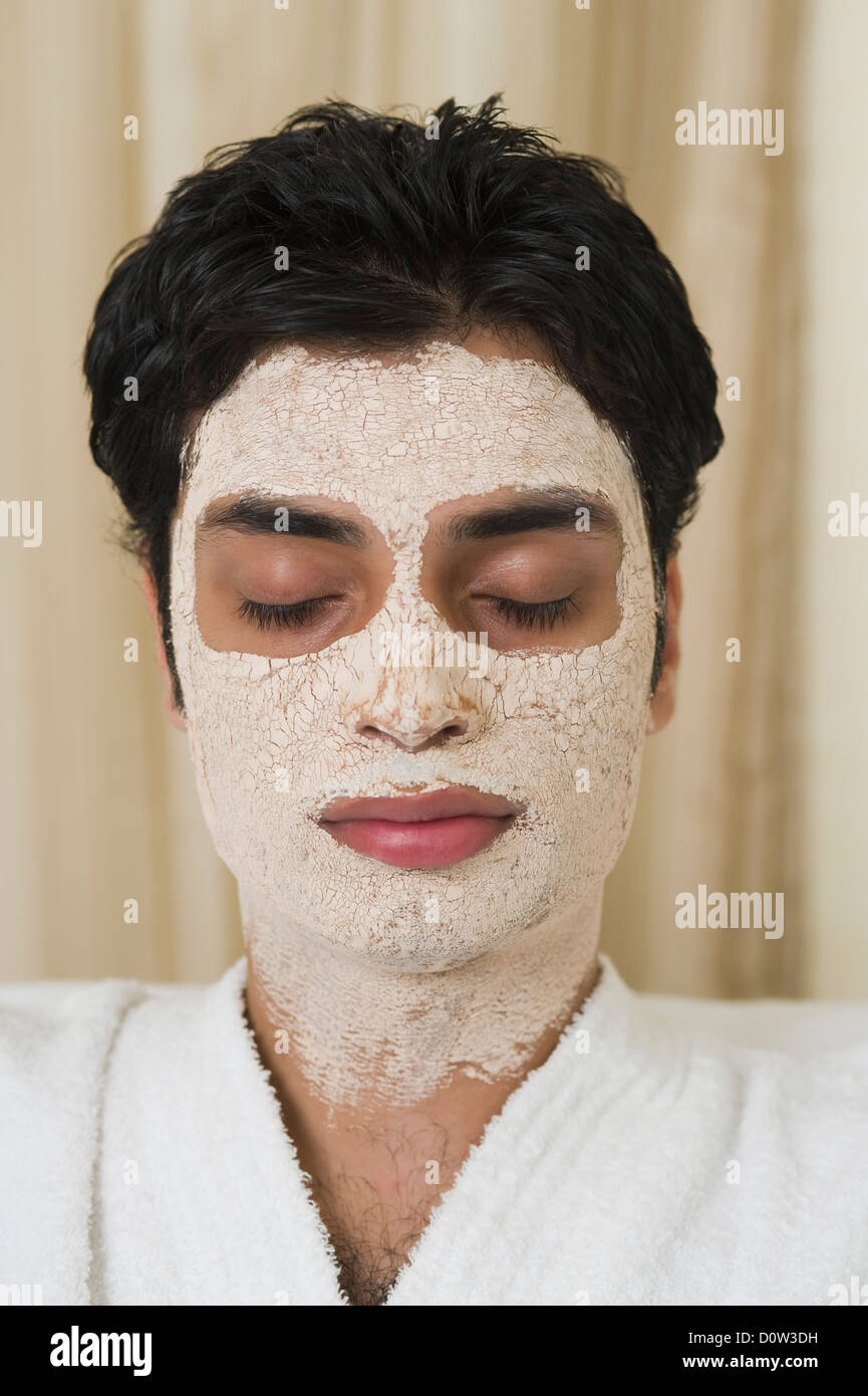 Close-up of a man with facial mask Stock Photo - Alamy