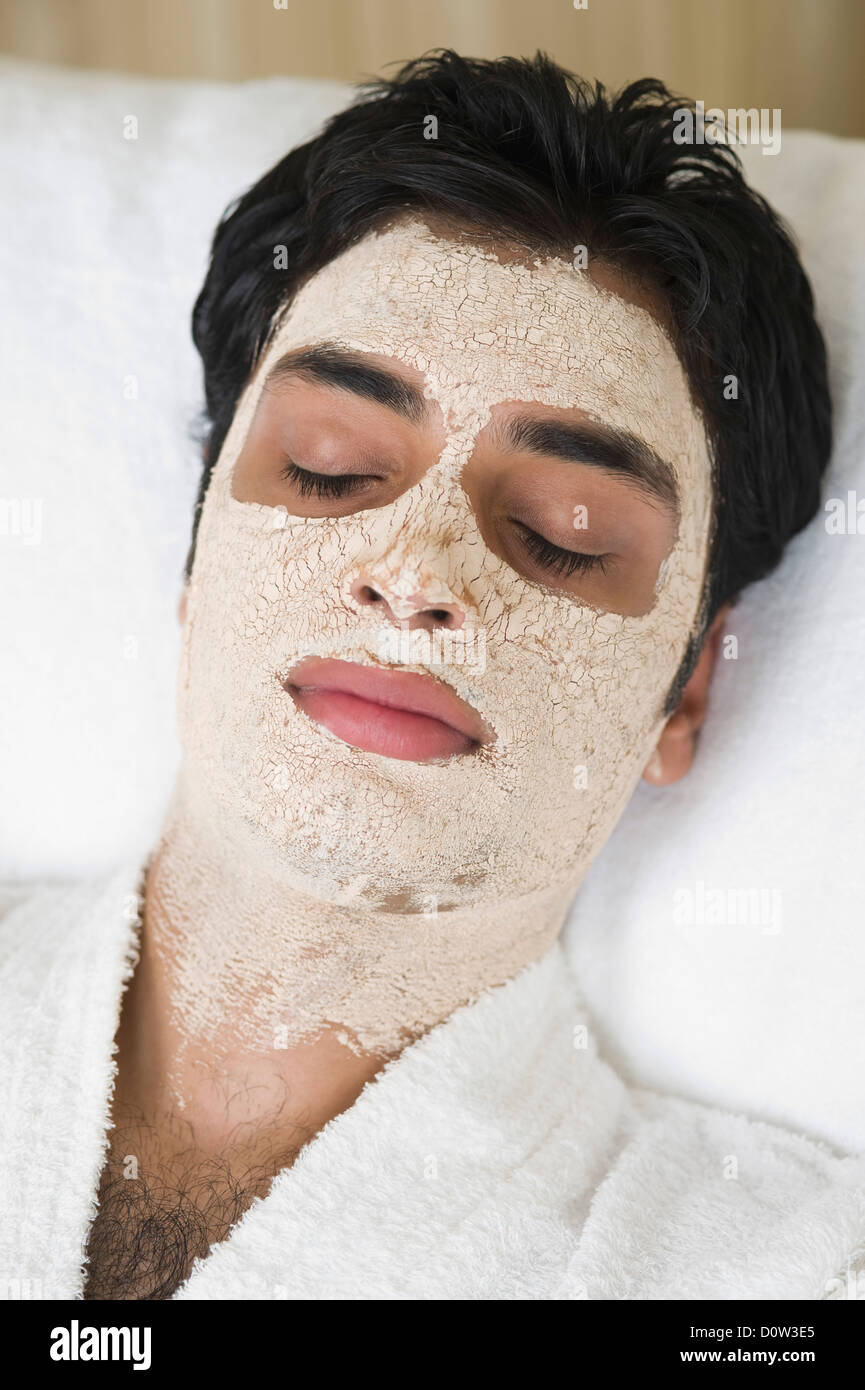 Close-up of a man with facial mask Stock Photo - Alamy