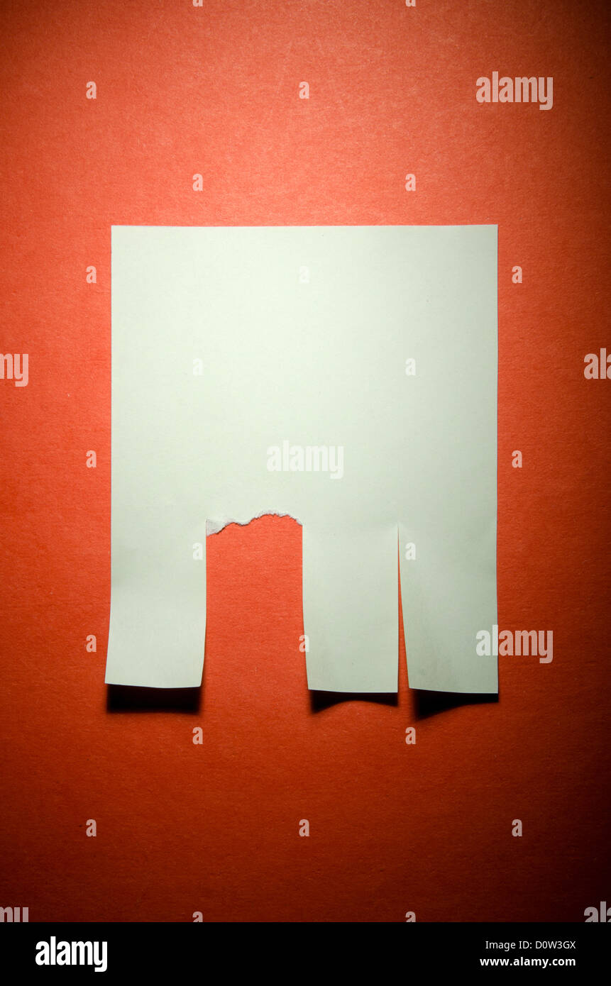 Tear off paper notice on the wall Stock Photo - Alamy