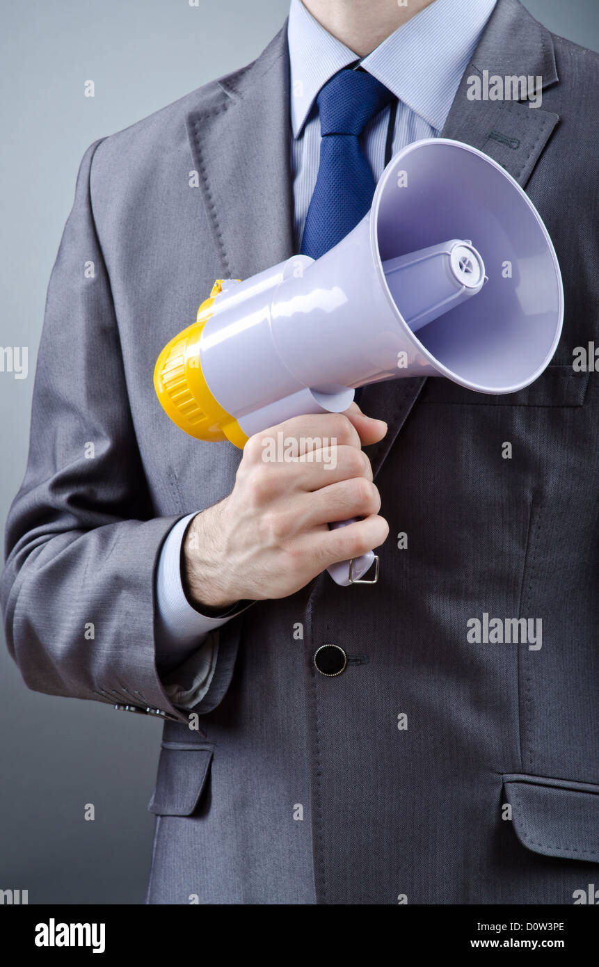 Man shouting and yelling with loudspeaker Stock Photo - Alamy