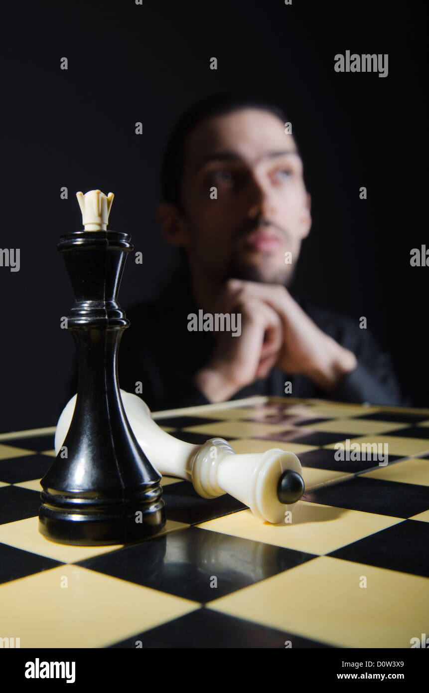 Chess player playing his game Stock Photo - Alamy