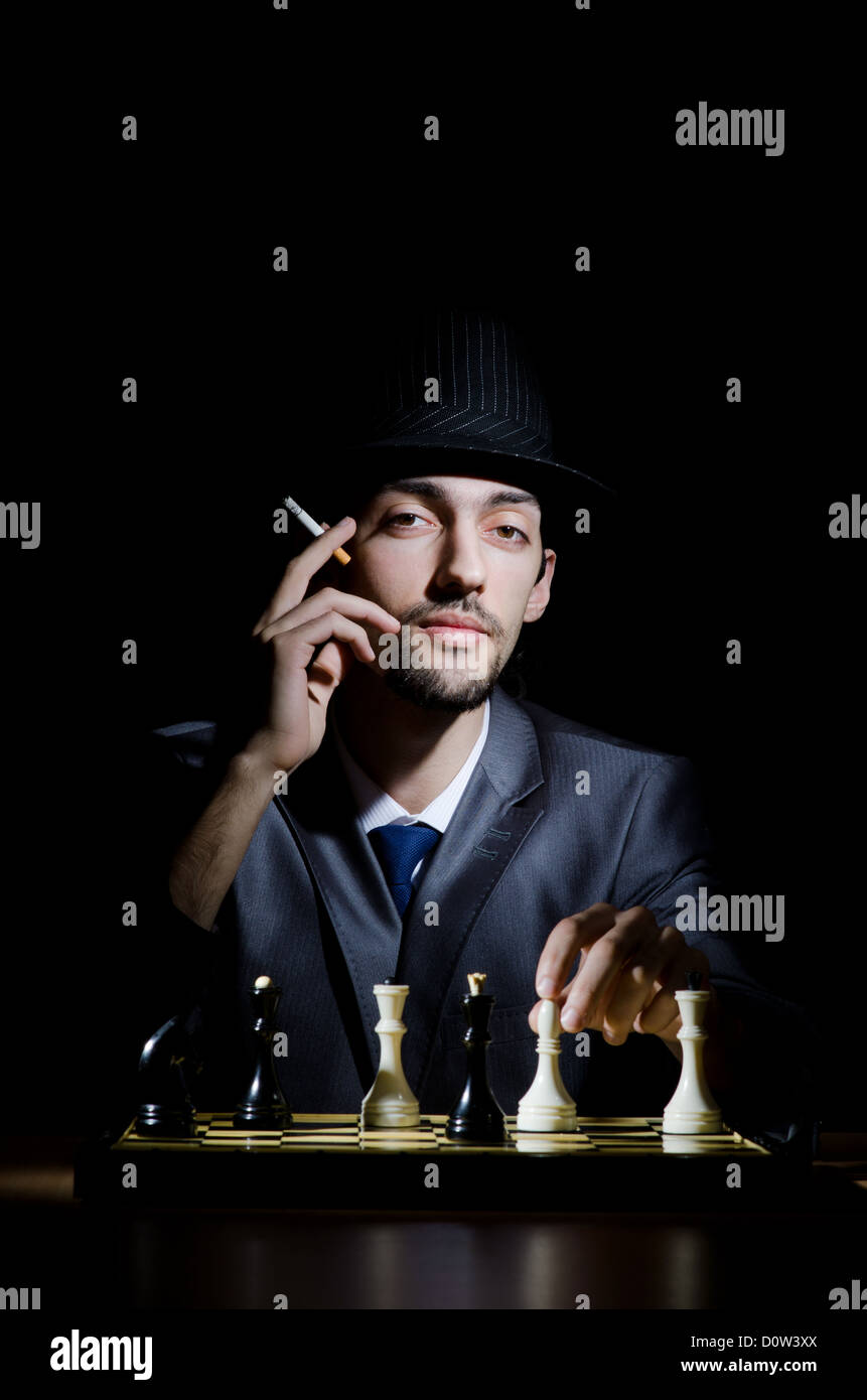 Chess player playing his game Stock Photo - Alamy