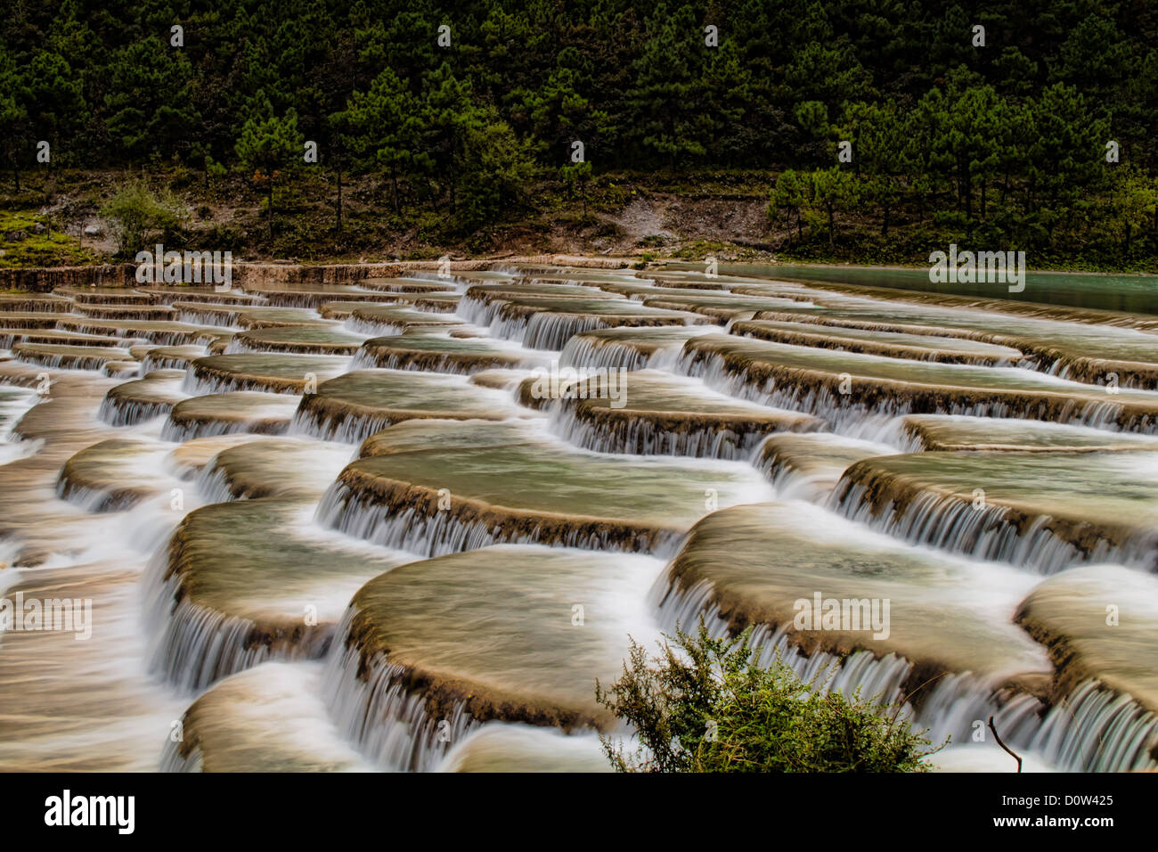 These unique step falls are located in the Yulong mountain range near ...
