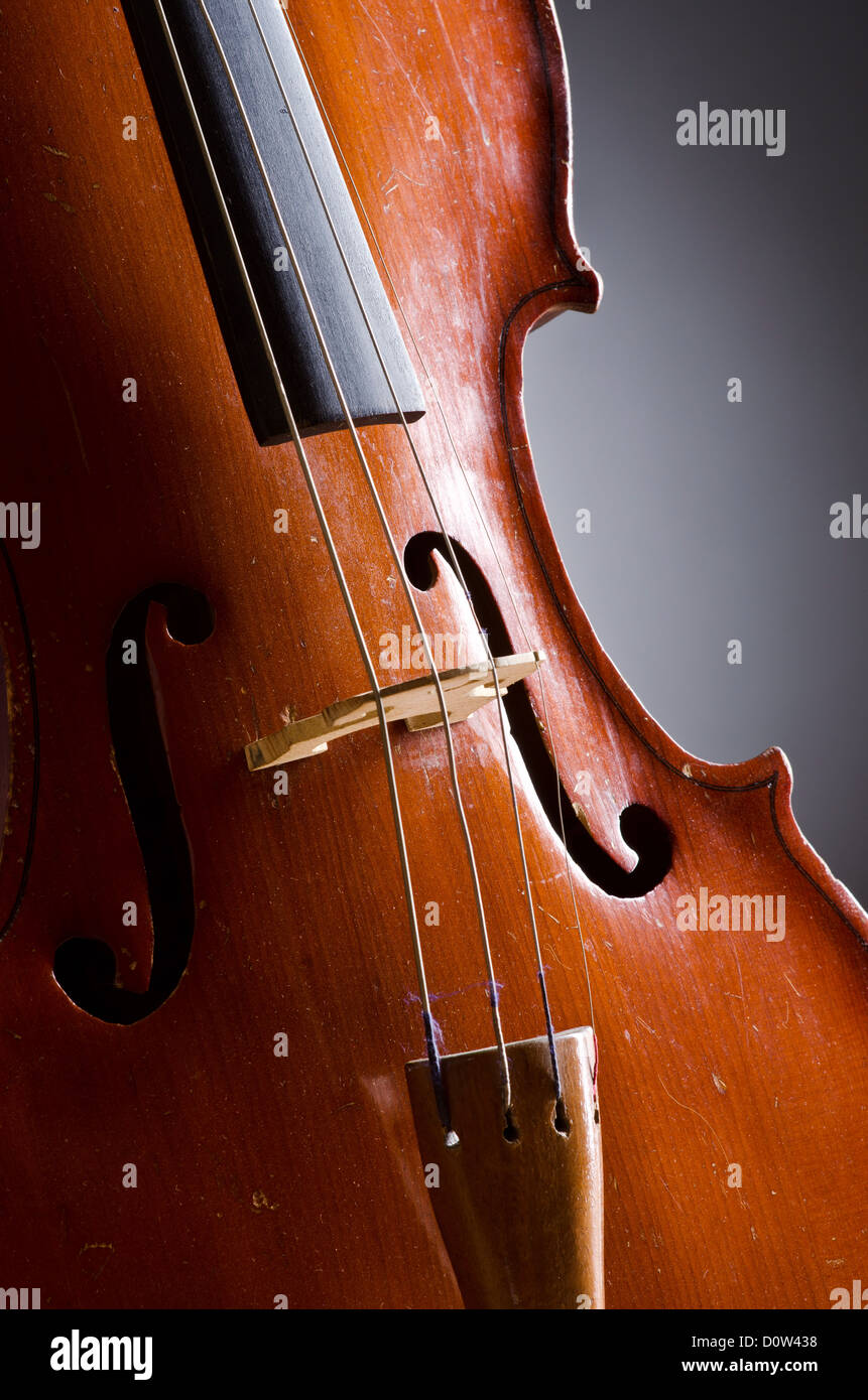 Music Cello in the dark room Stock Photo - Alamy