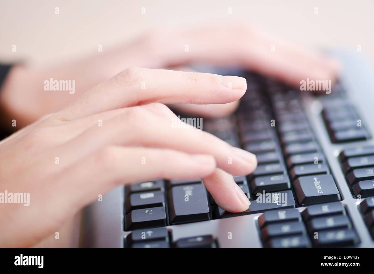 Hands typing on the keyboard Stock Photo - Alamy