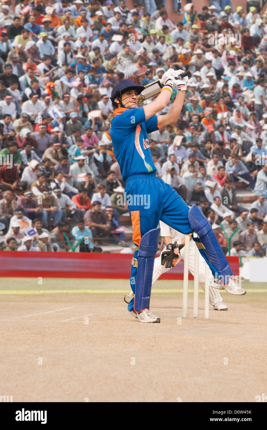 Cricket batsman playing a hook shot Stock Photo - Alamy