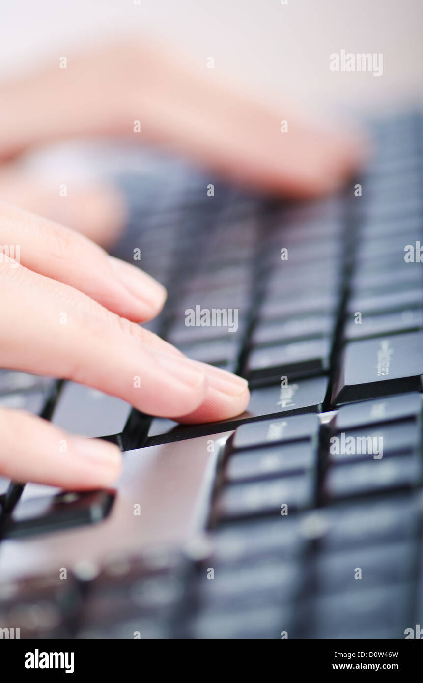 Hands typing on the keyboard Stock Photo - Alamy