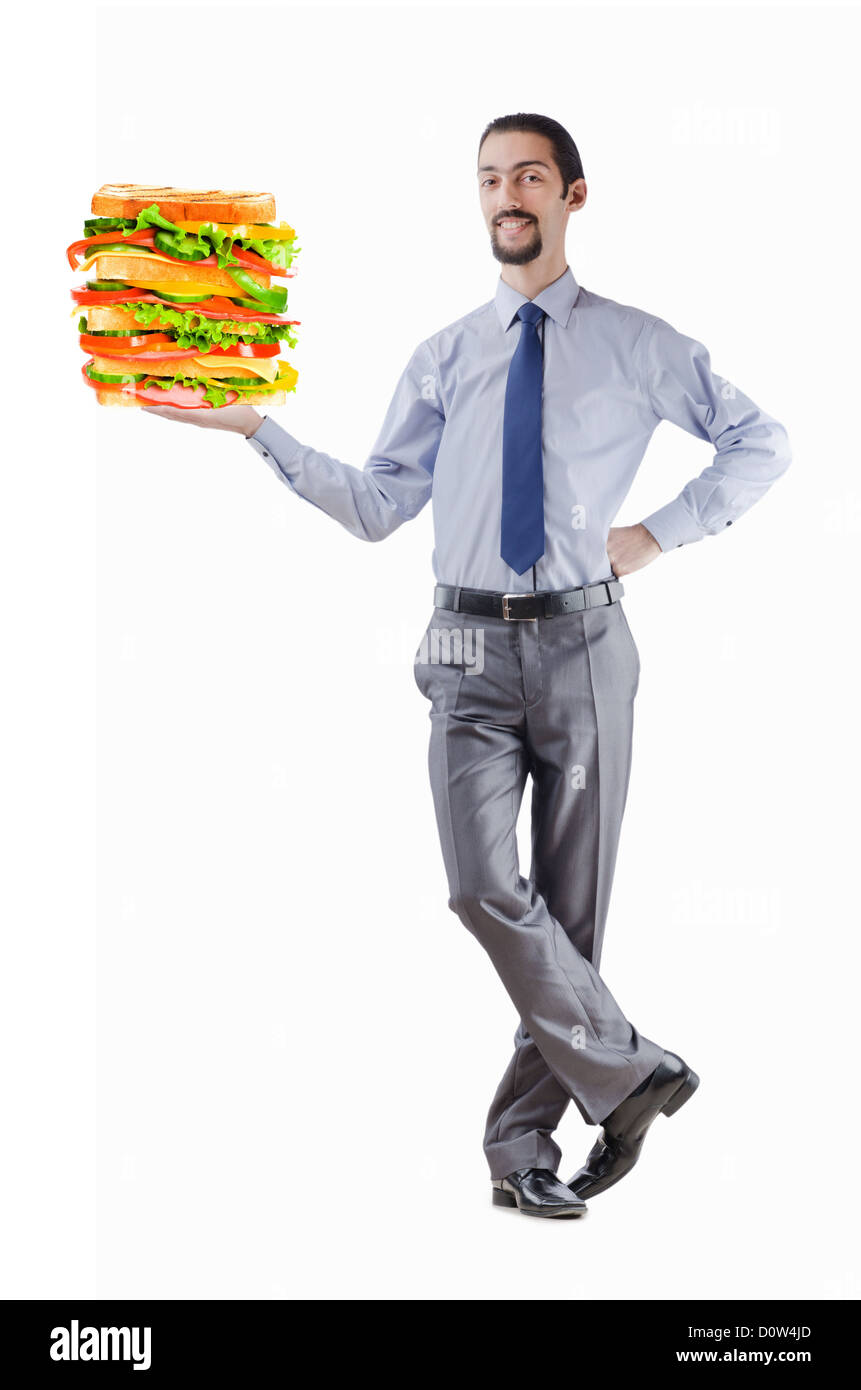 Man and giant sandwich on white Stock Photo - Alamy