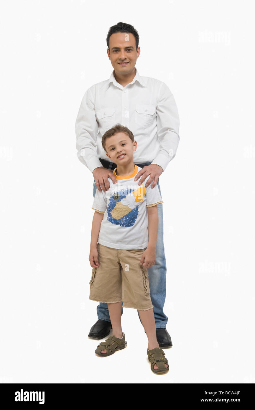 Man standing with his son Stock Photo - Alamy