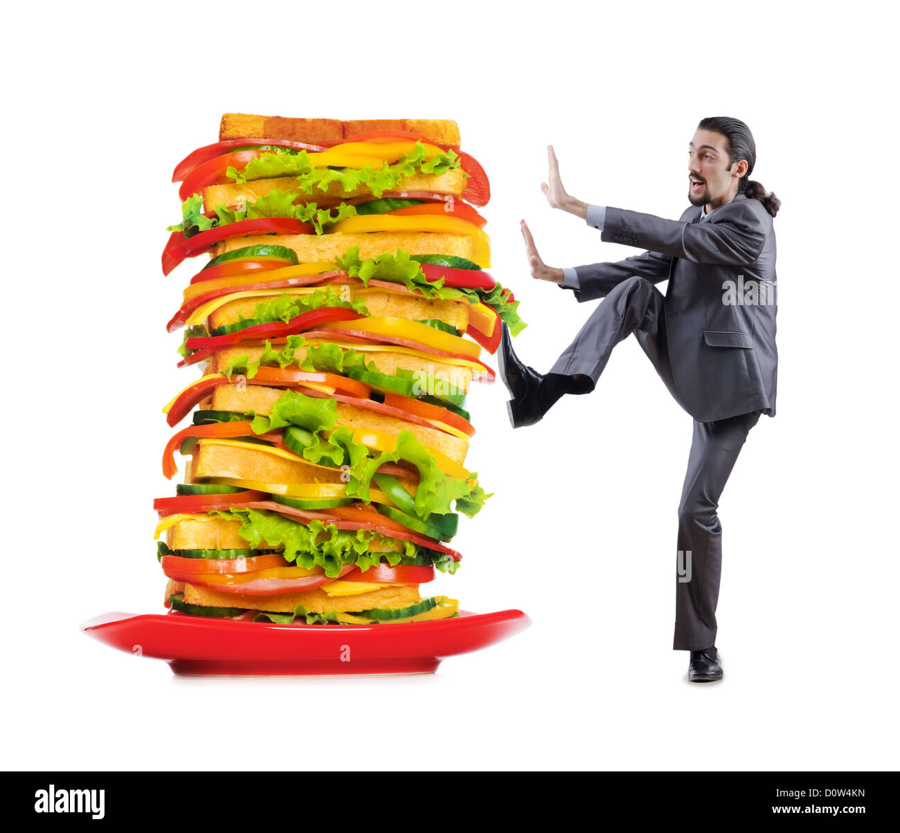 Man and giant sandwich on white Stock Photo - Alamy