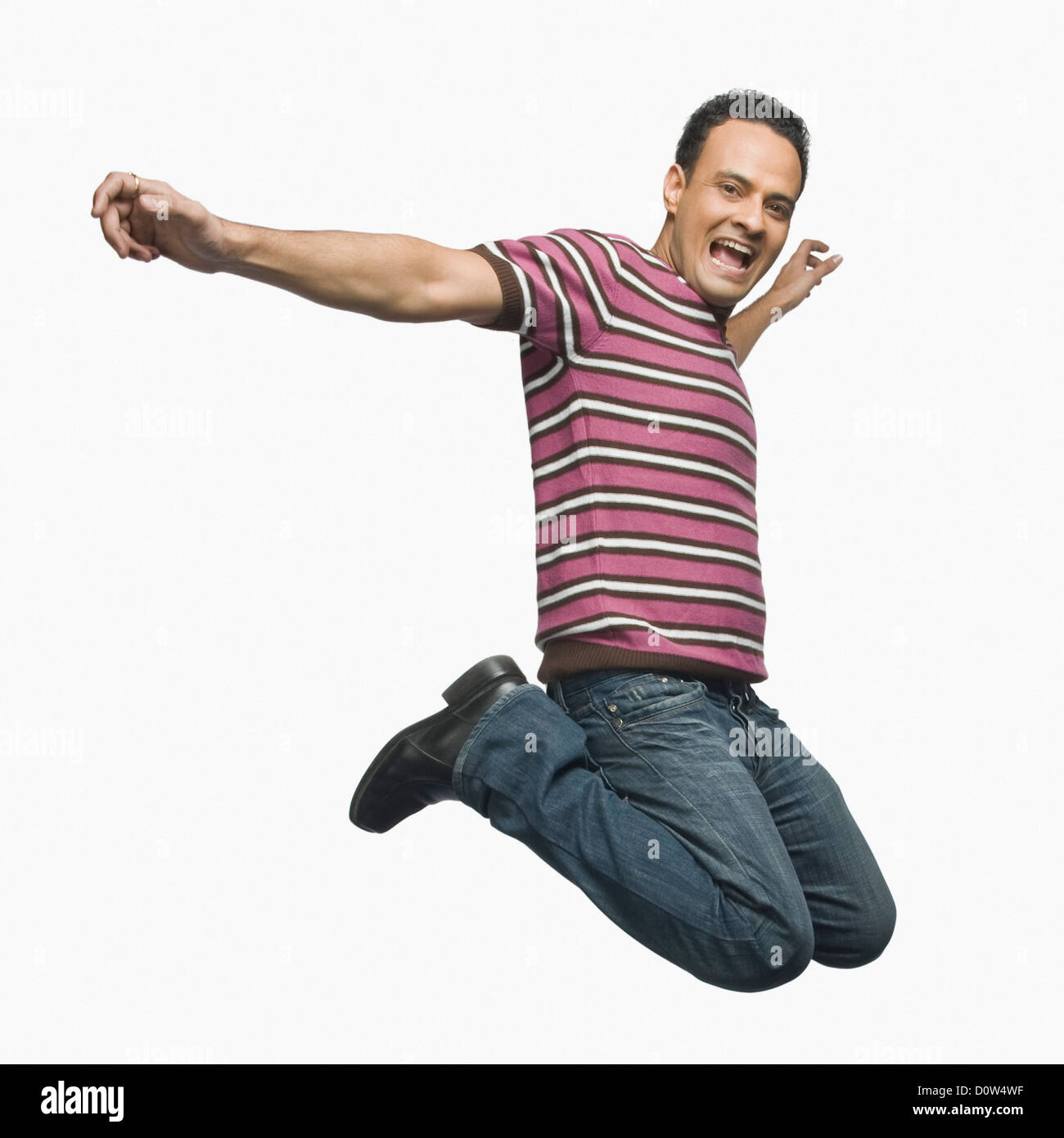 Man jumping and shouting Stock Photo - Alamy