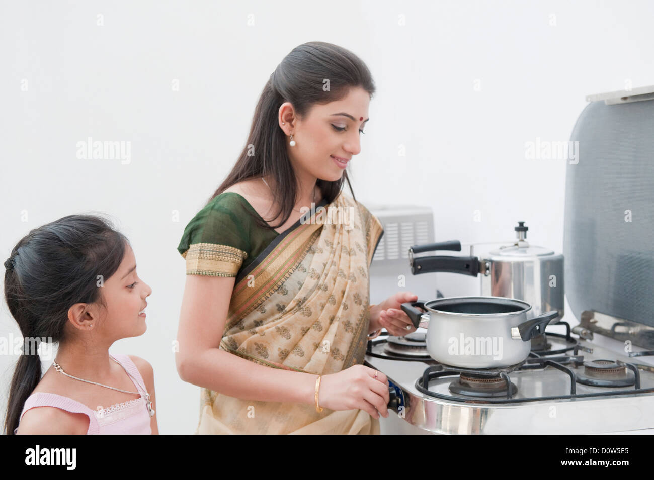Children cooking food indian hi-res stock photography and images - Alamy