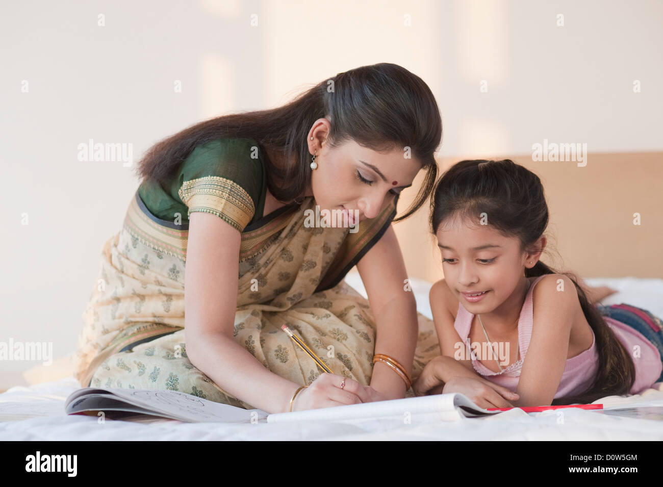 Helping hand child age 9 adult hi-res stock photography and images - Alamy