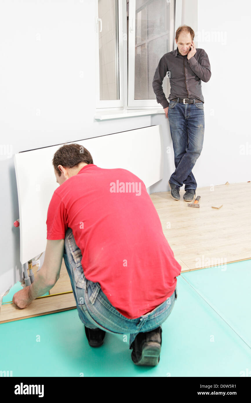 Men at work Stock Photo - Alamy