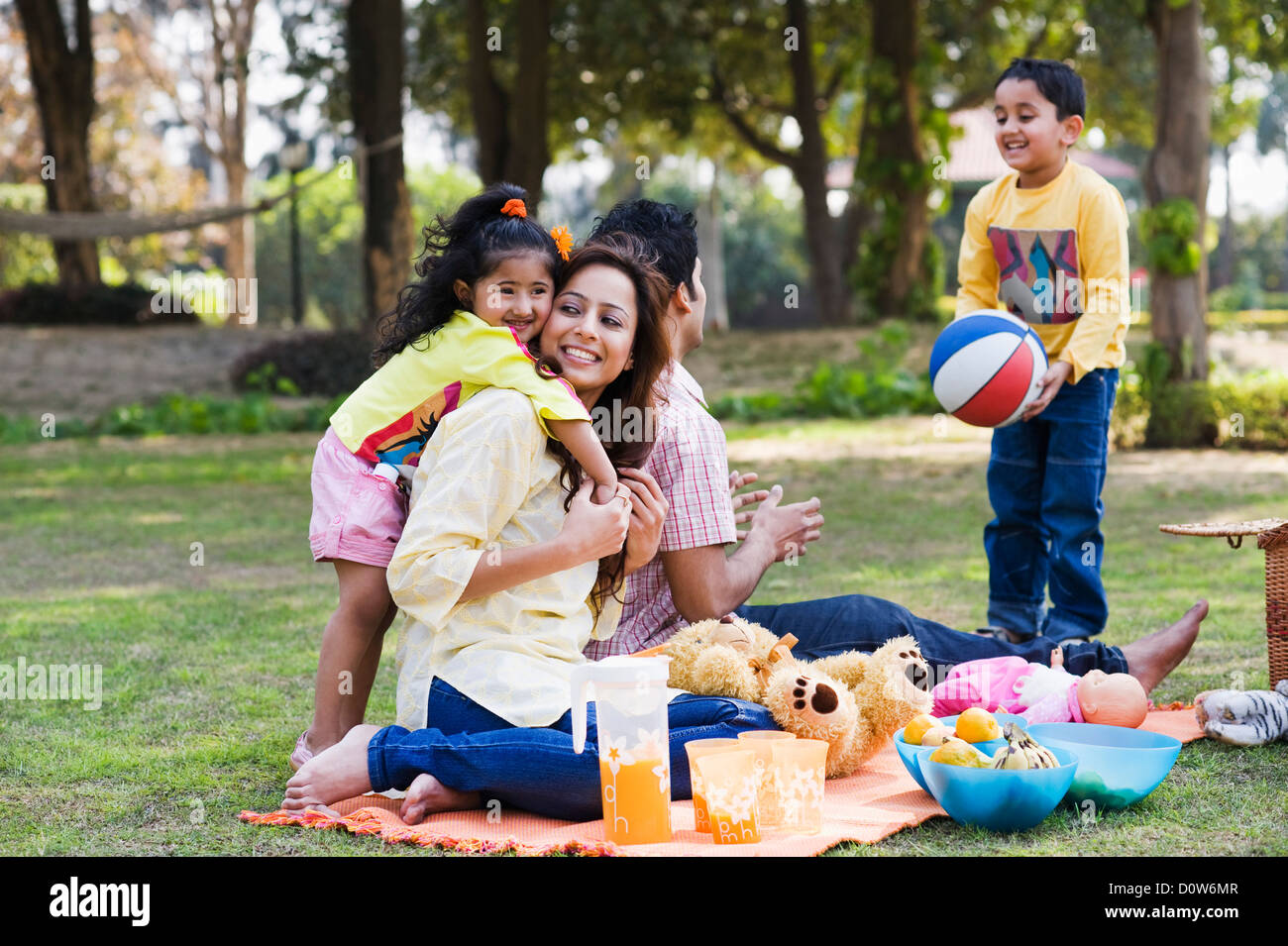 Family enjoying picnic in a garden, Gurgaon, Haryana, India Stock Photo ...