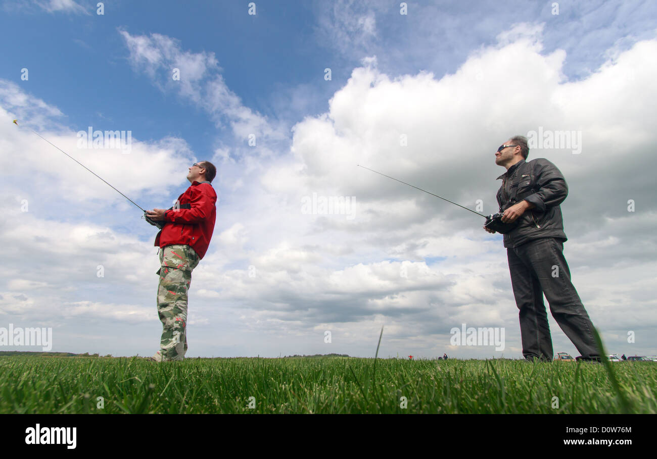 Two Man controls RC gliders Stock Photo - Alamy