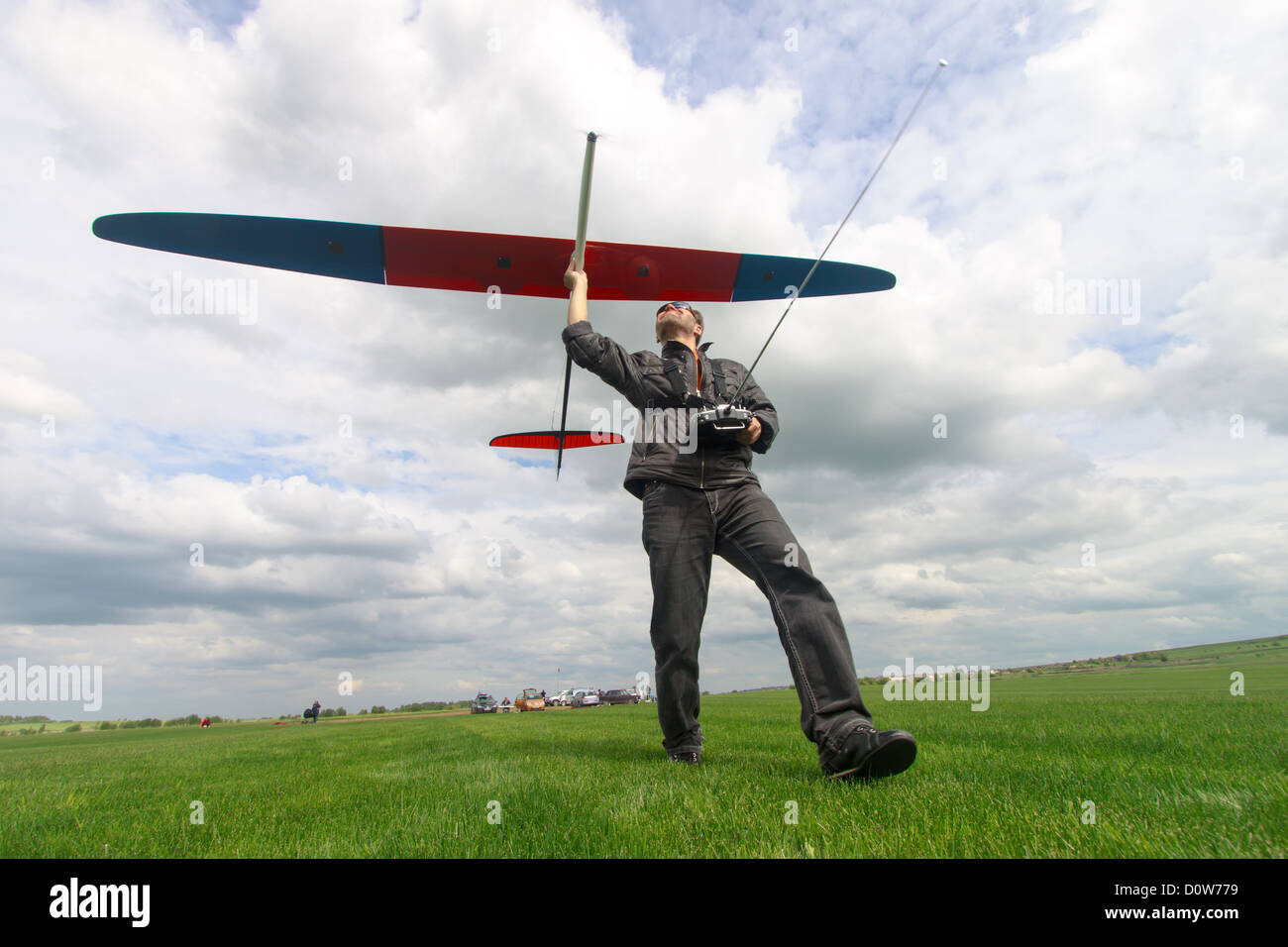 Man launches into the sky RC glider Stock Photo - Alamy