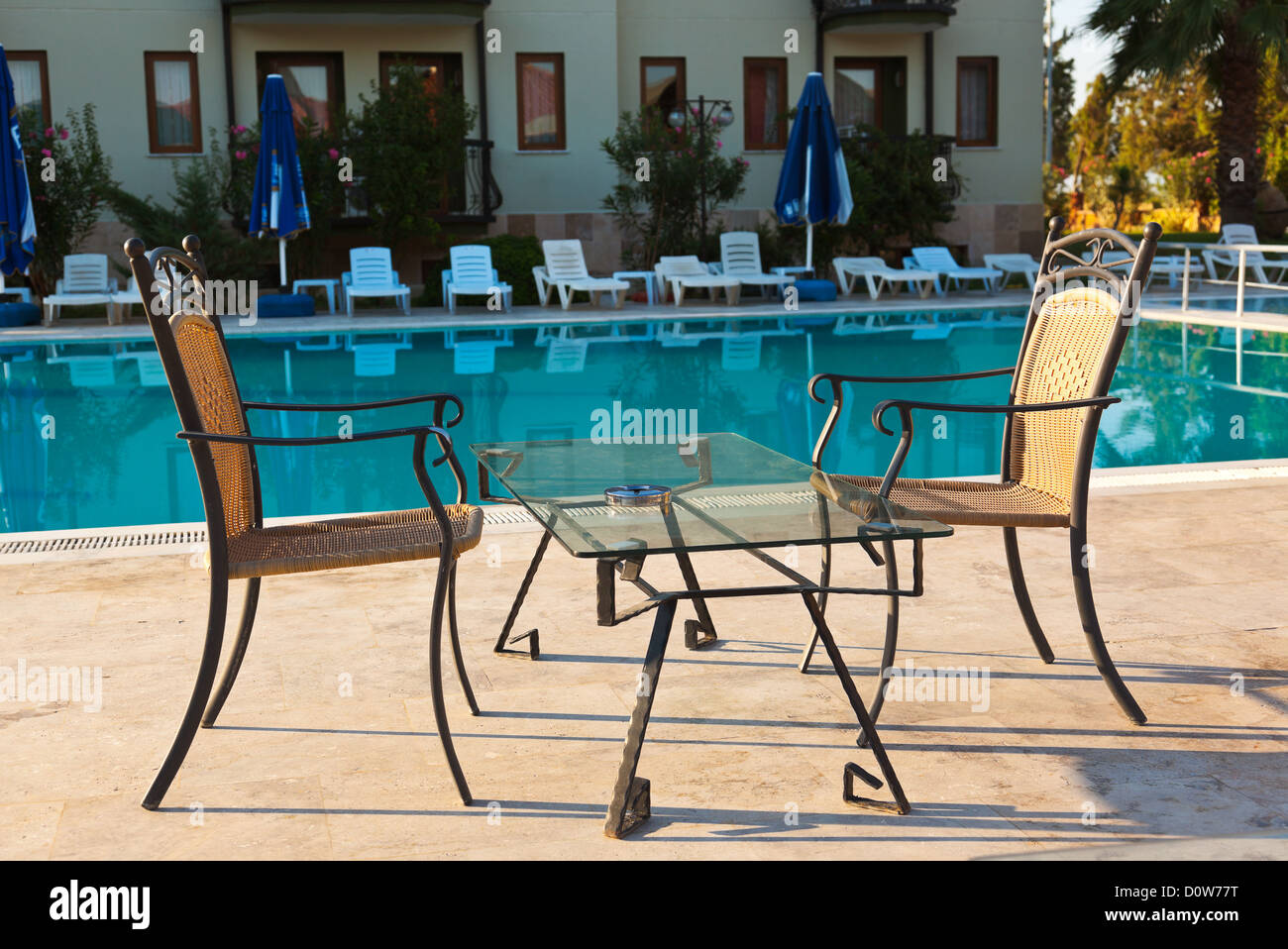 Water pool and cafe in hotel Stock Photo - Alamy