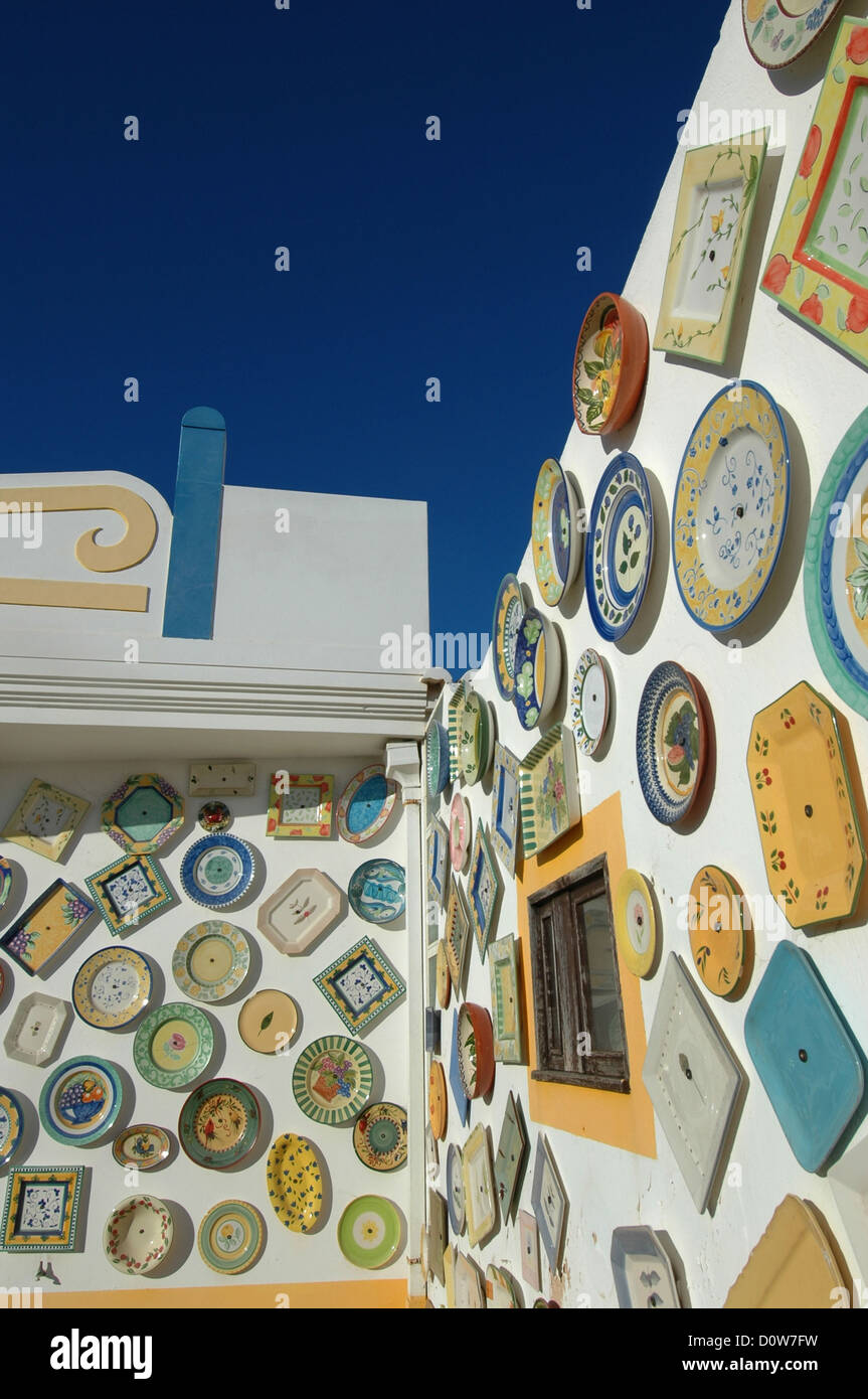 Traditional Portuguese hand painted plates decorating exterior of an ...