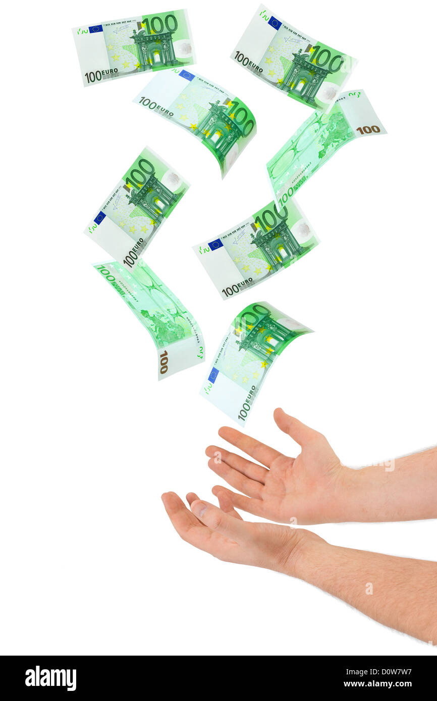 Hand and falling money Stock Photo - Alamy