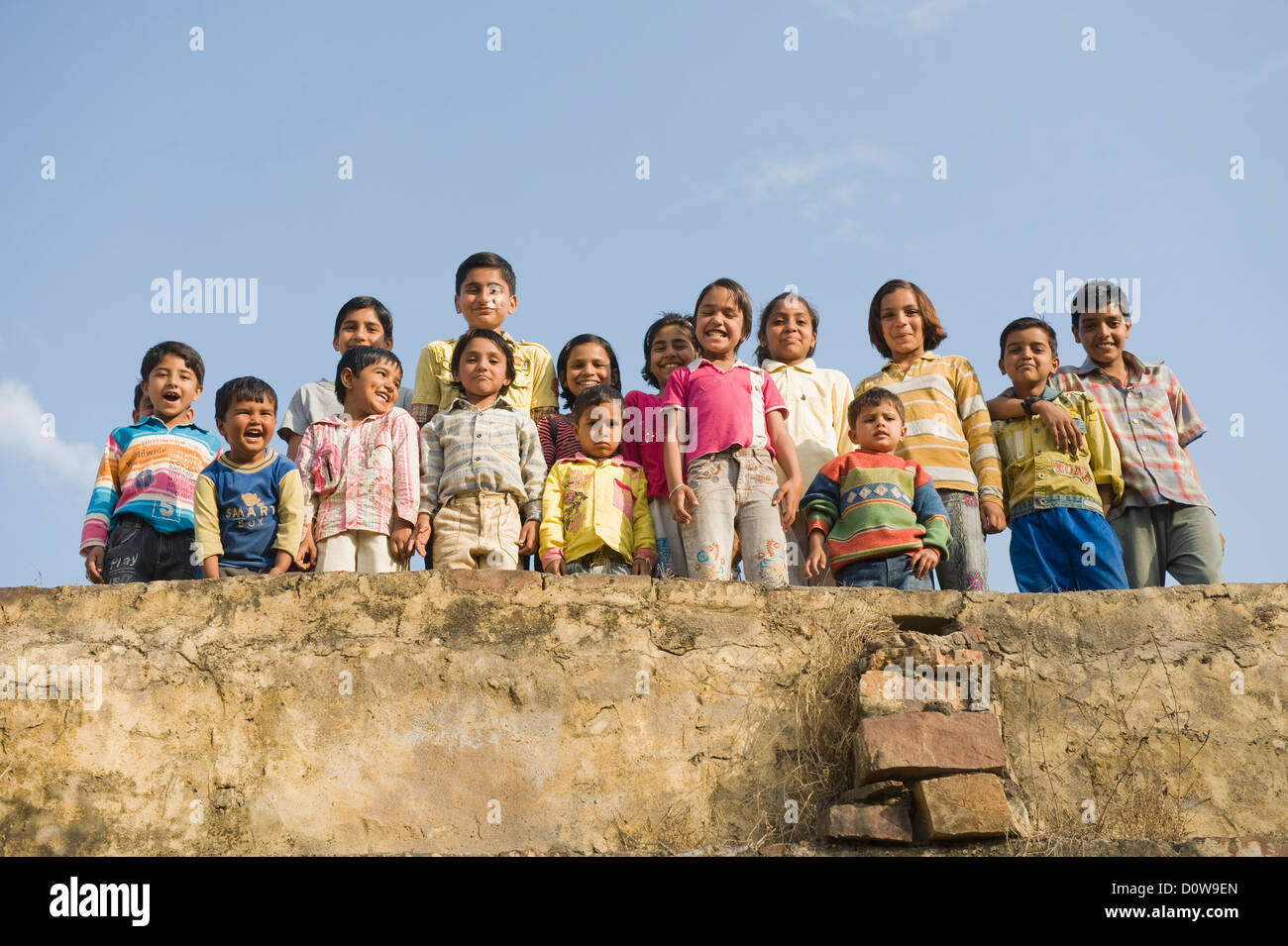 Kid girl standing on roof hi-res stock photography and images - Alamy