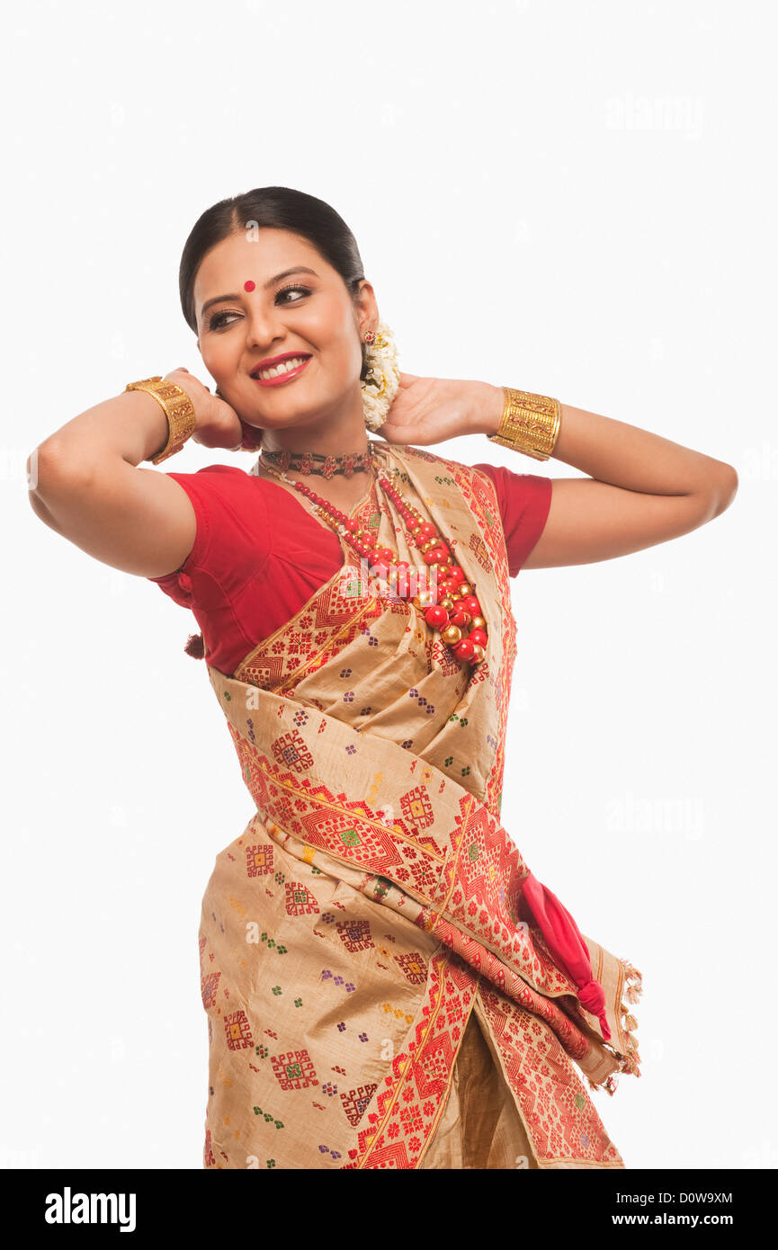Woman dancing on Bihu festival Stock Photo - Alamy