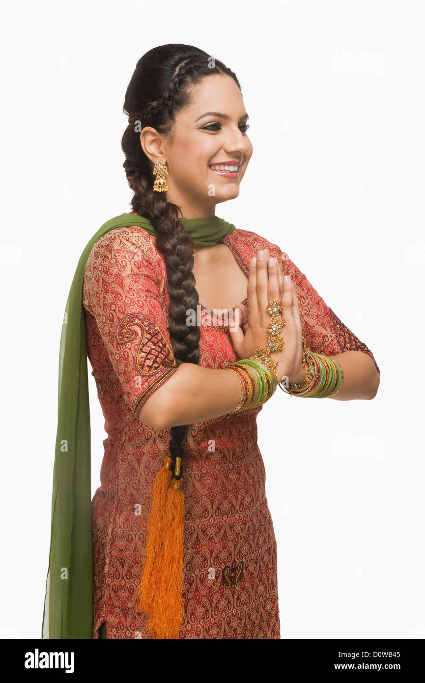 Woman greeting with smile Stock Photo - Alamy