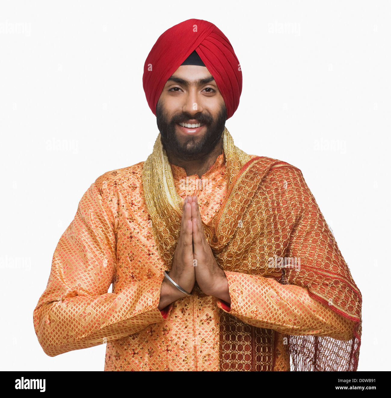 Sikh man greeting with smile Stock Photo - Alamy