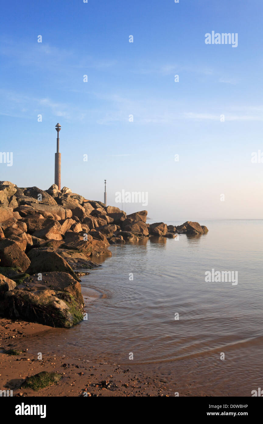 A view of a line of artificial reefs in clearing sea mist at Sea ...