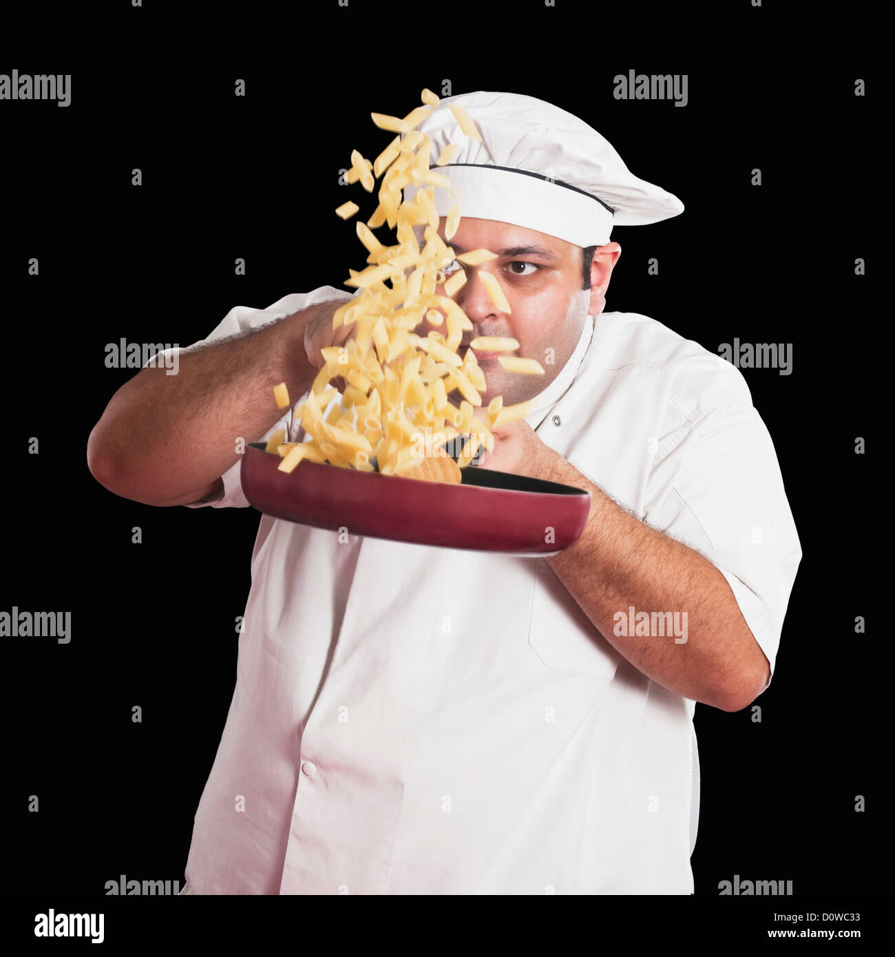 Chef cooking penne pasta Stock Photo - Alamy