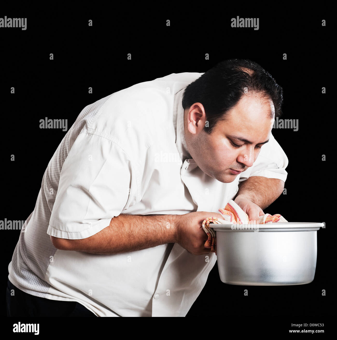 Chef smelling food Stock Photo - Alamy