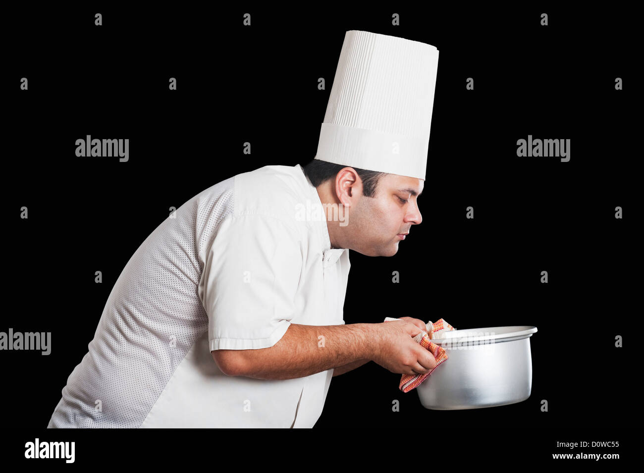 Chef smelling food Stock Photo - Alamy
