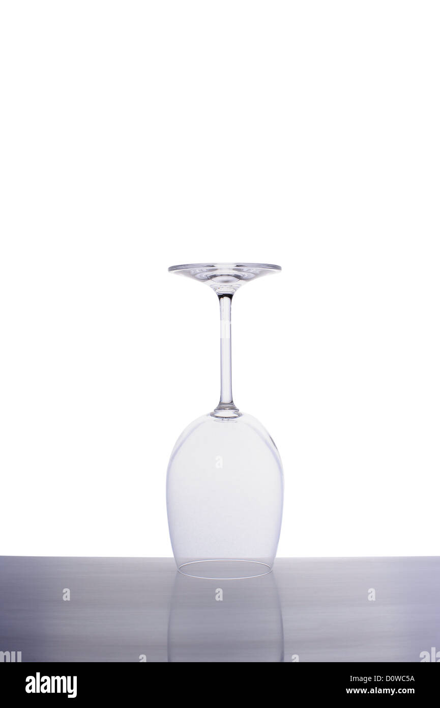Inverted empty wine glass isolated on white background Stock Photo - Alamy