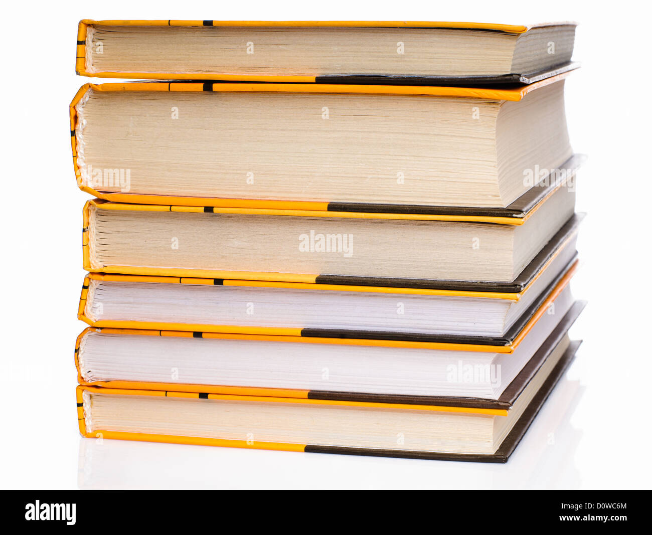 Big stack of yellow books isolated on white background Stock Photo - Alamy