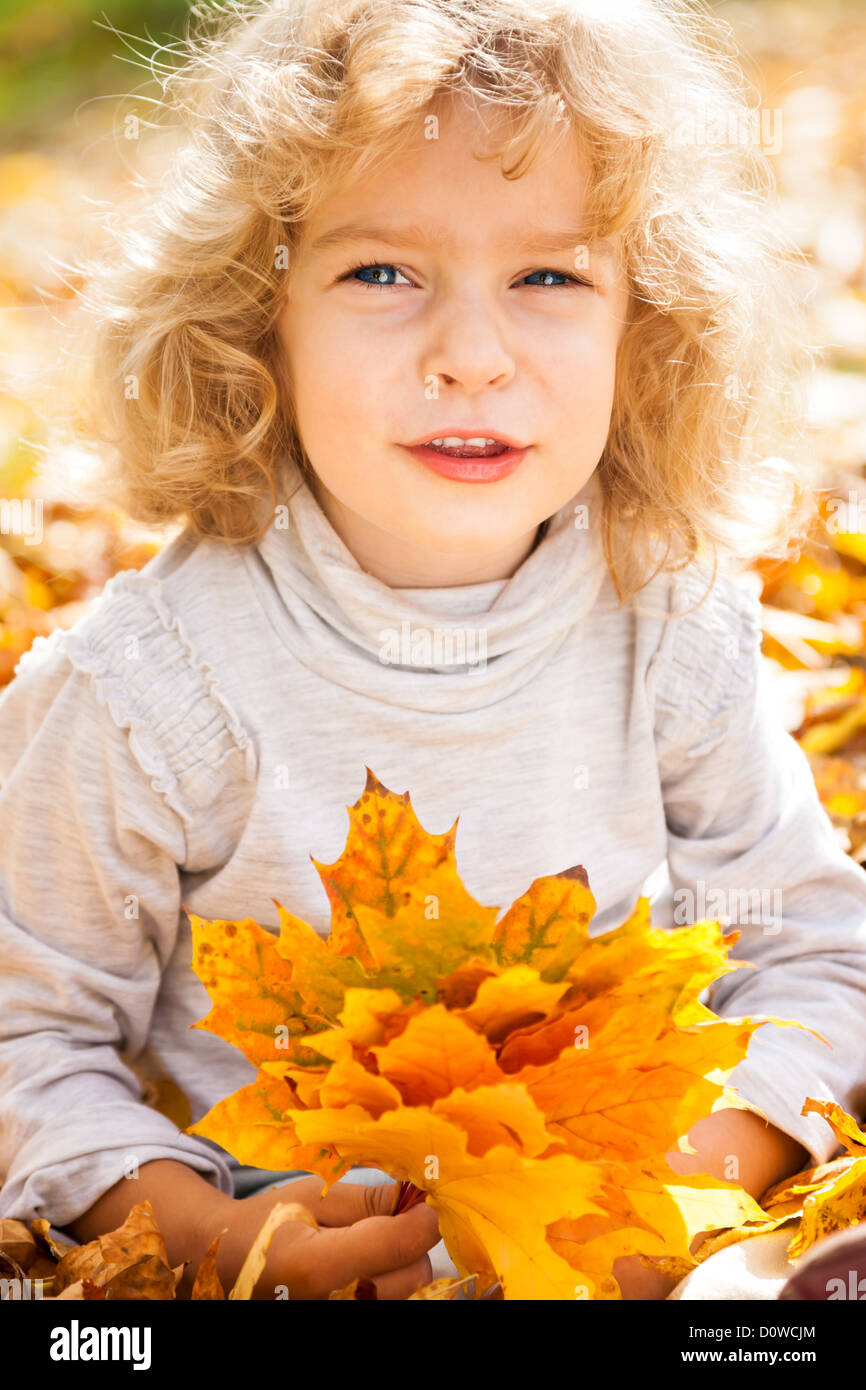 Funny kid in autumn Stock Photo - Alamy