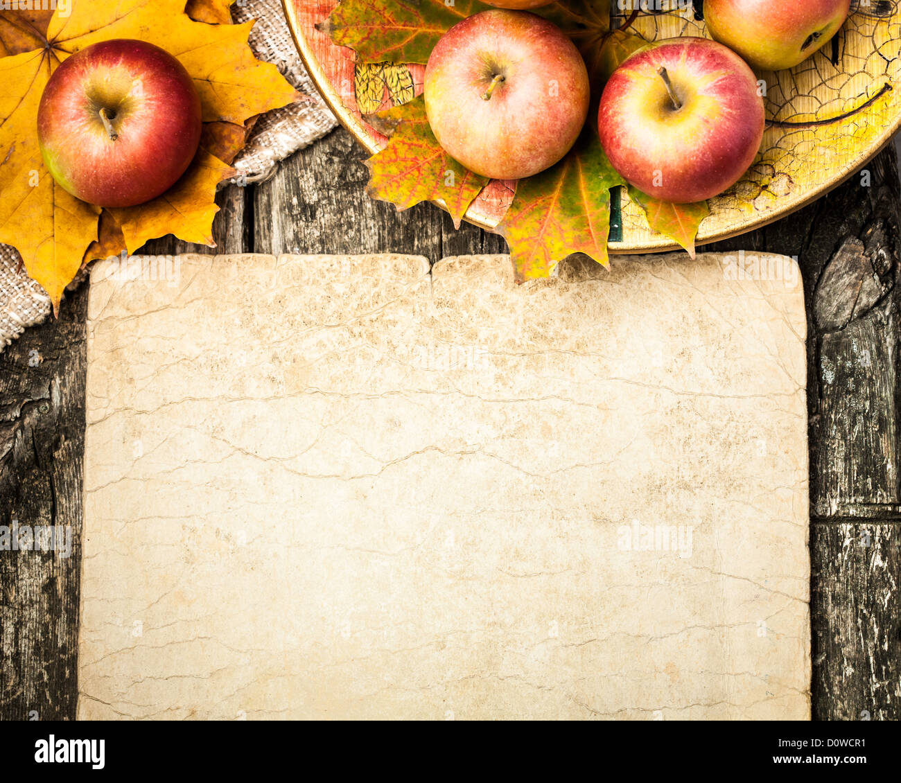 Autumn border from apples and leaves Stock Photo - Alamy