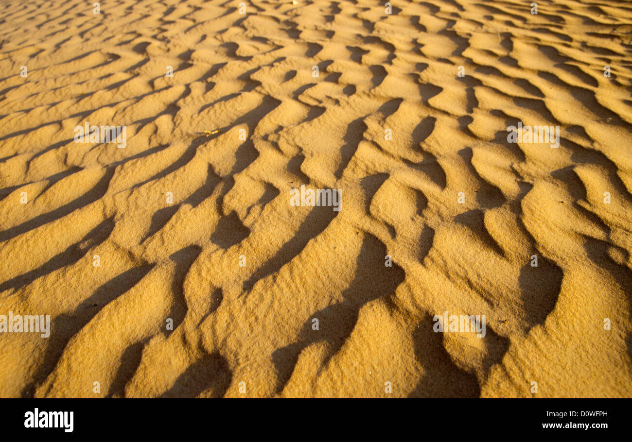 Sand texture in Gold desert Stock Photo - Alamy