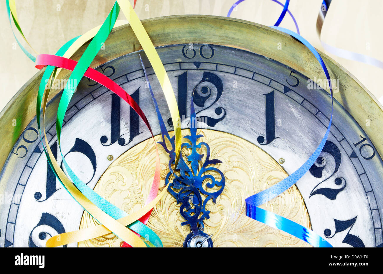 Antique clock with New Year ribbons Stock Photo - Alamy