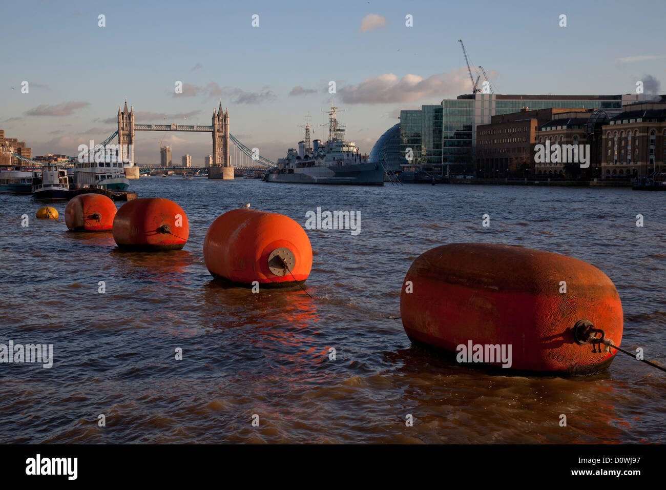 Buoys water traffic signs on river Thames in London, with Tower Bridge ...