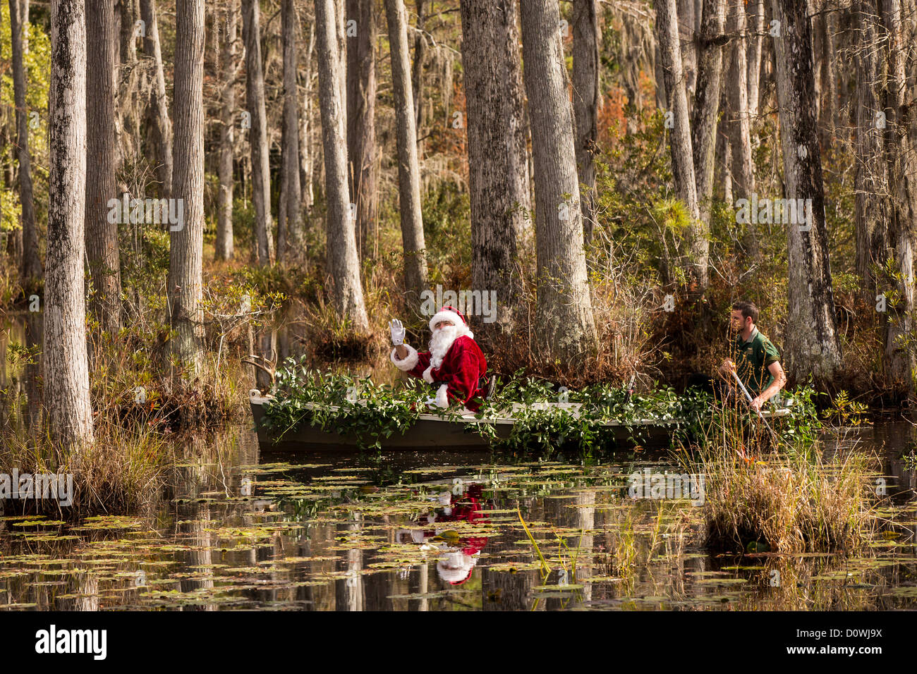 Charleston, USA. 1st December 2012. Santa Claus arrives by swamp boat ...