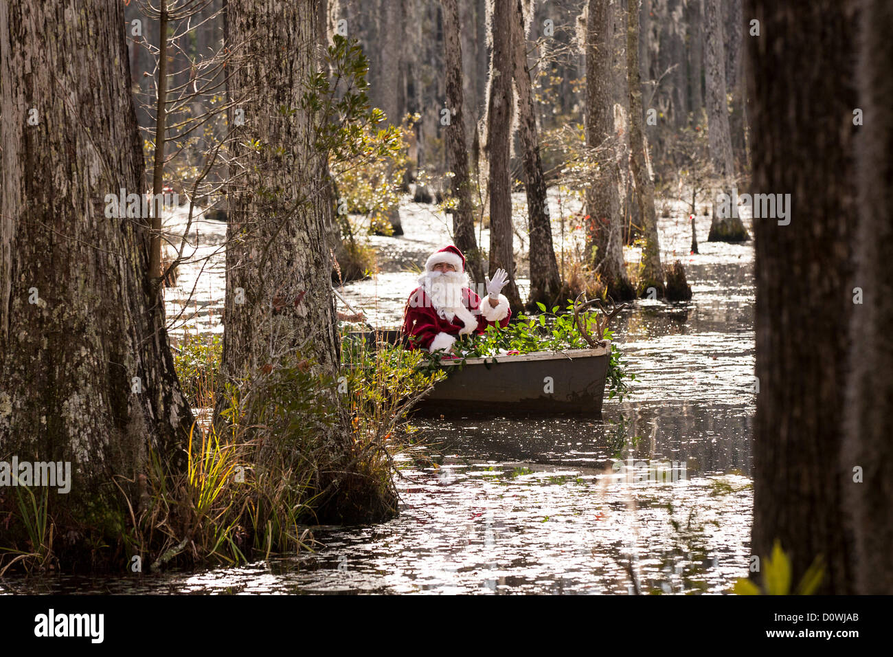 Charleston, USA. 1st December 2012. Santa Claus arrives by swamp boat ...