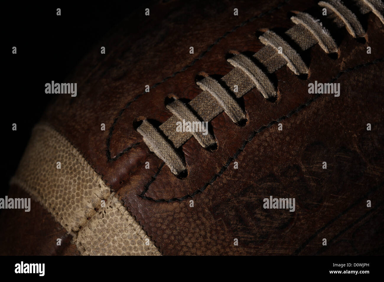 A studio shot of a traditionally laced vintage Wilson American Football ...