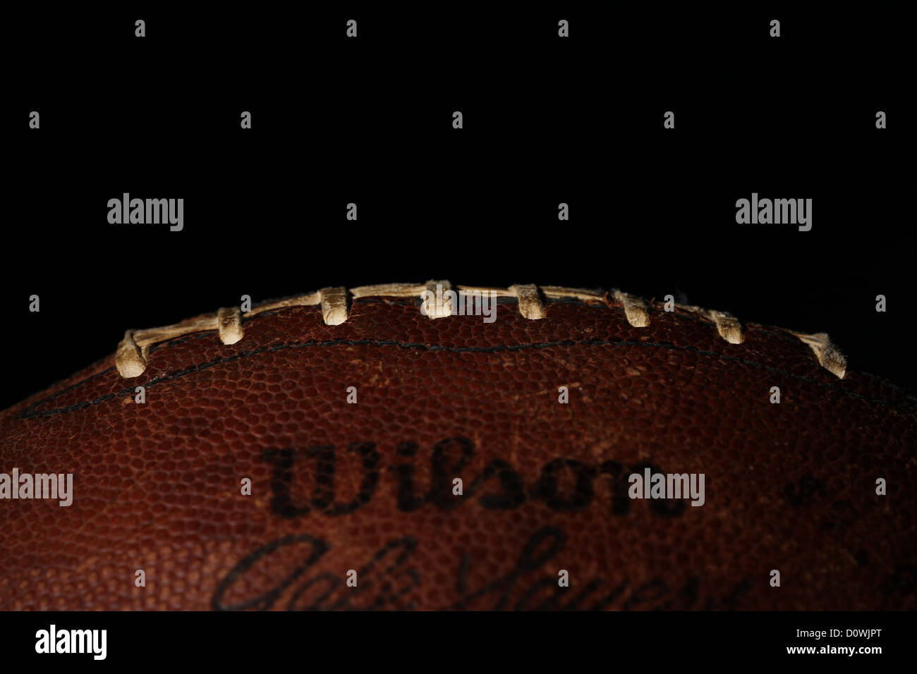 A studio shot of a traditionally laced vintage Wilson American Football ...