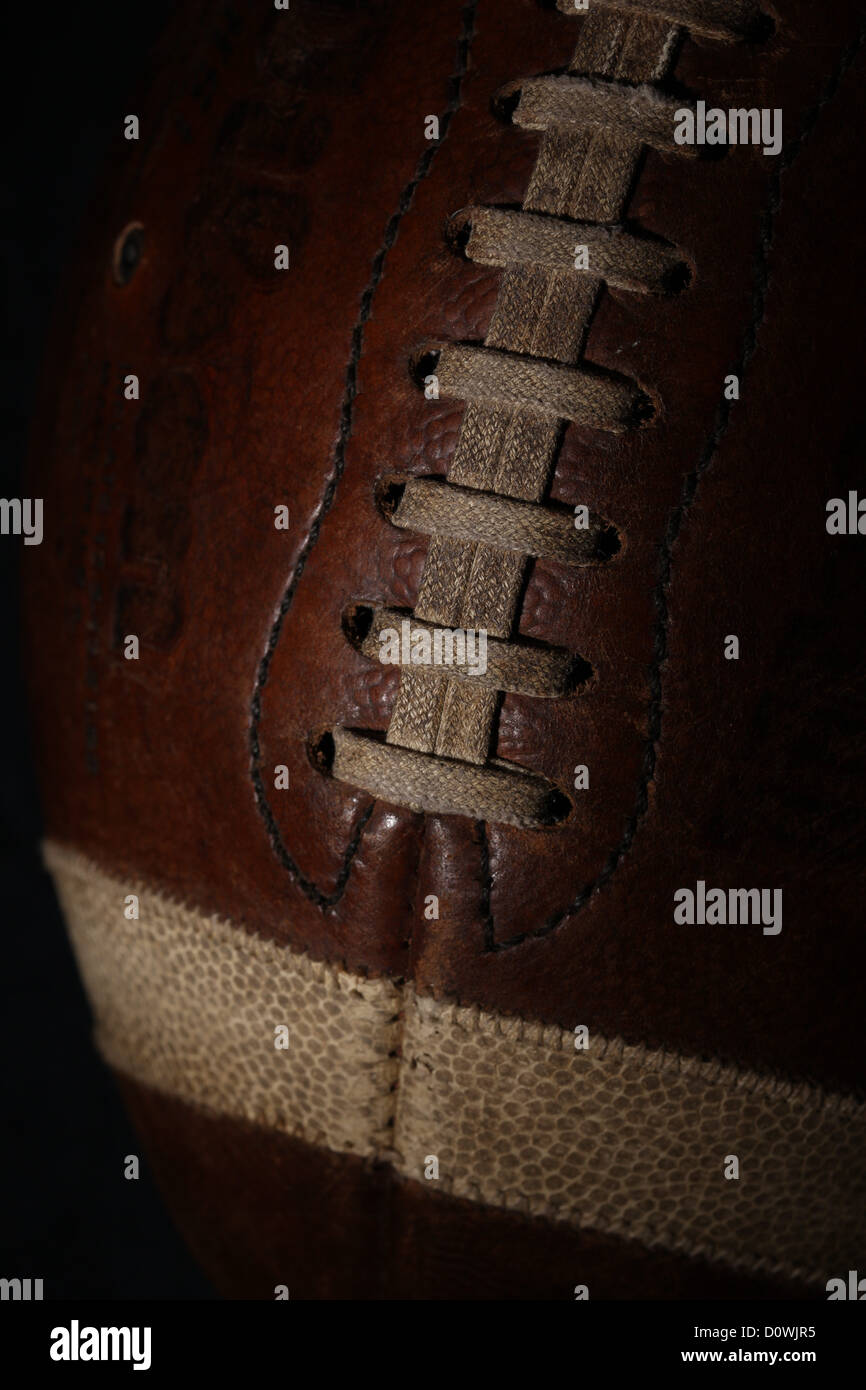 A studio shot of a traditionally laced vintage Wilson American Football ...