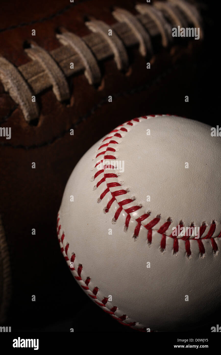 A studio shot of an American Football and a baseball Stock Photo - Alamy