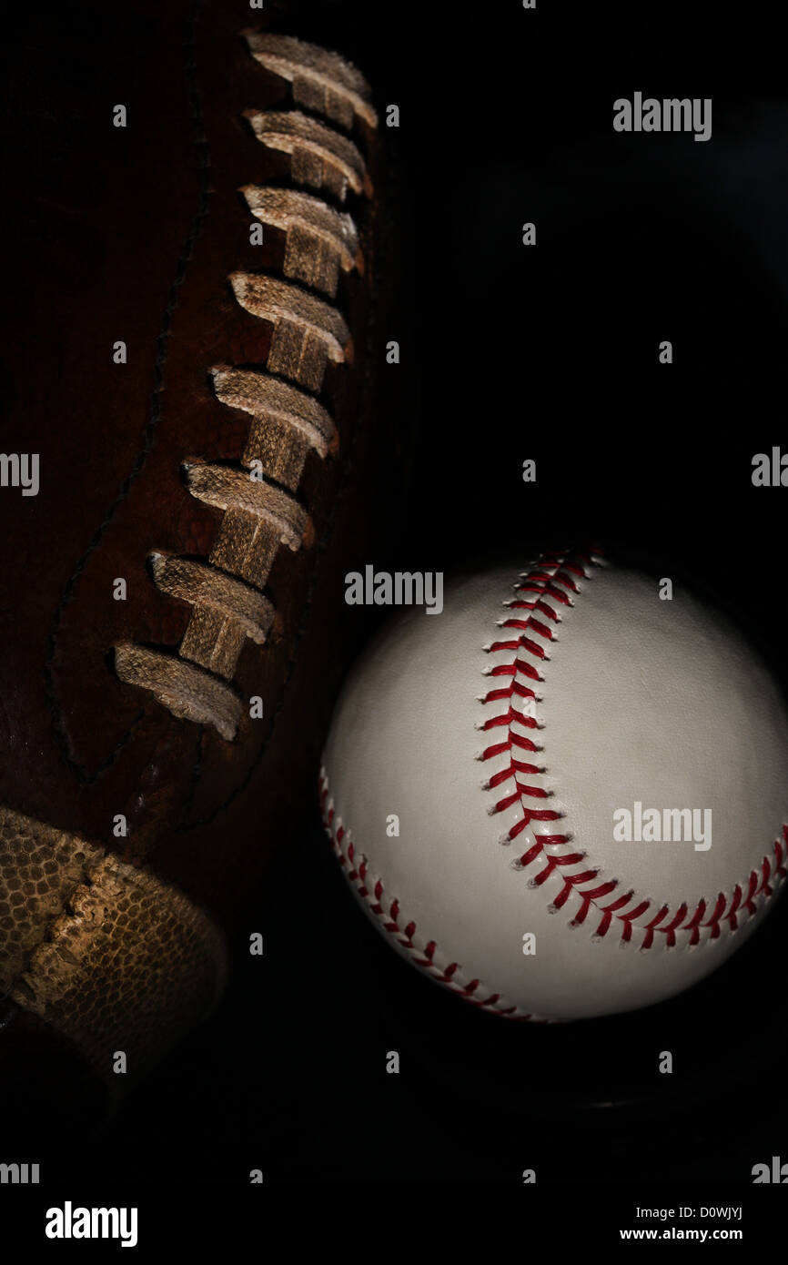 A studio shot of an American Football and a baseball Stock Photo - Alamy